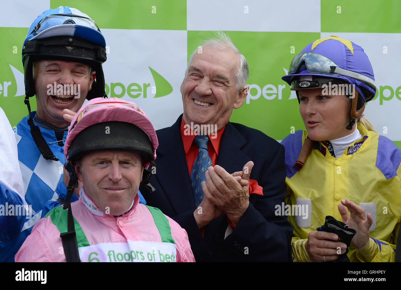 Former trainer Jack Berry (centre) shares a joke with jockeys Luke ...
