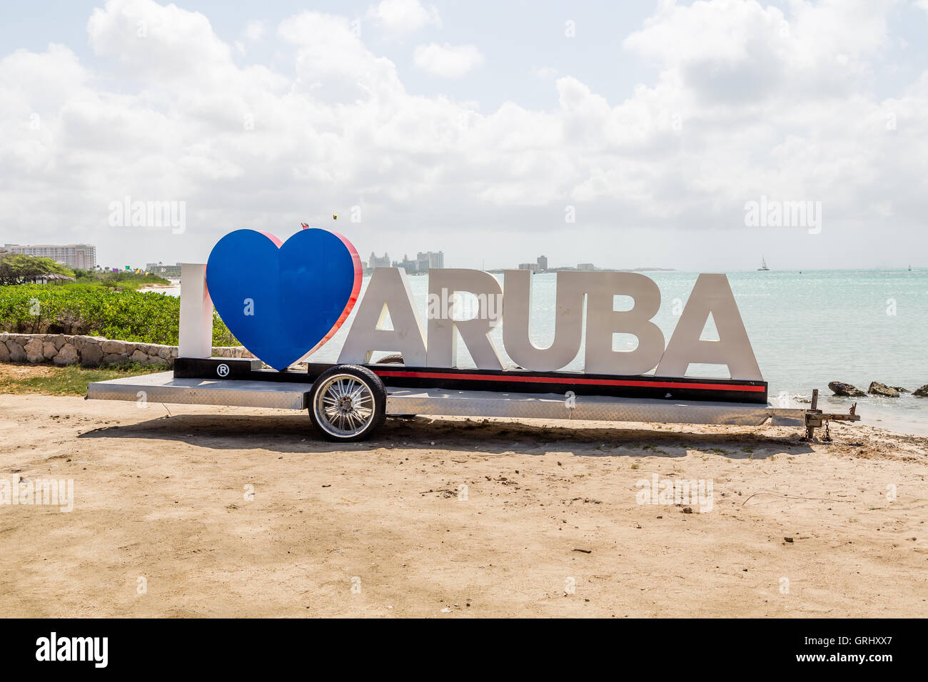 An I Heart Aruba Sign on a trailer parked on the beach Stock Photo - Alamy