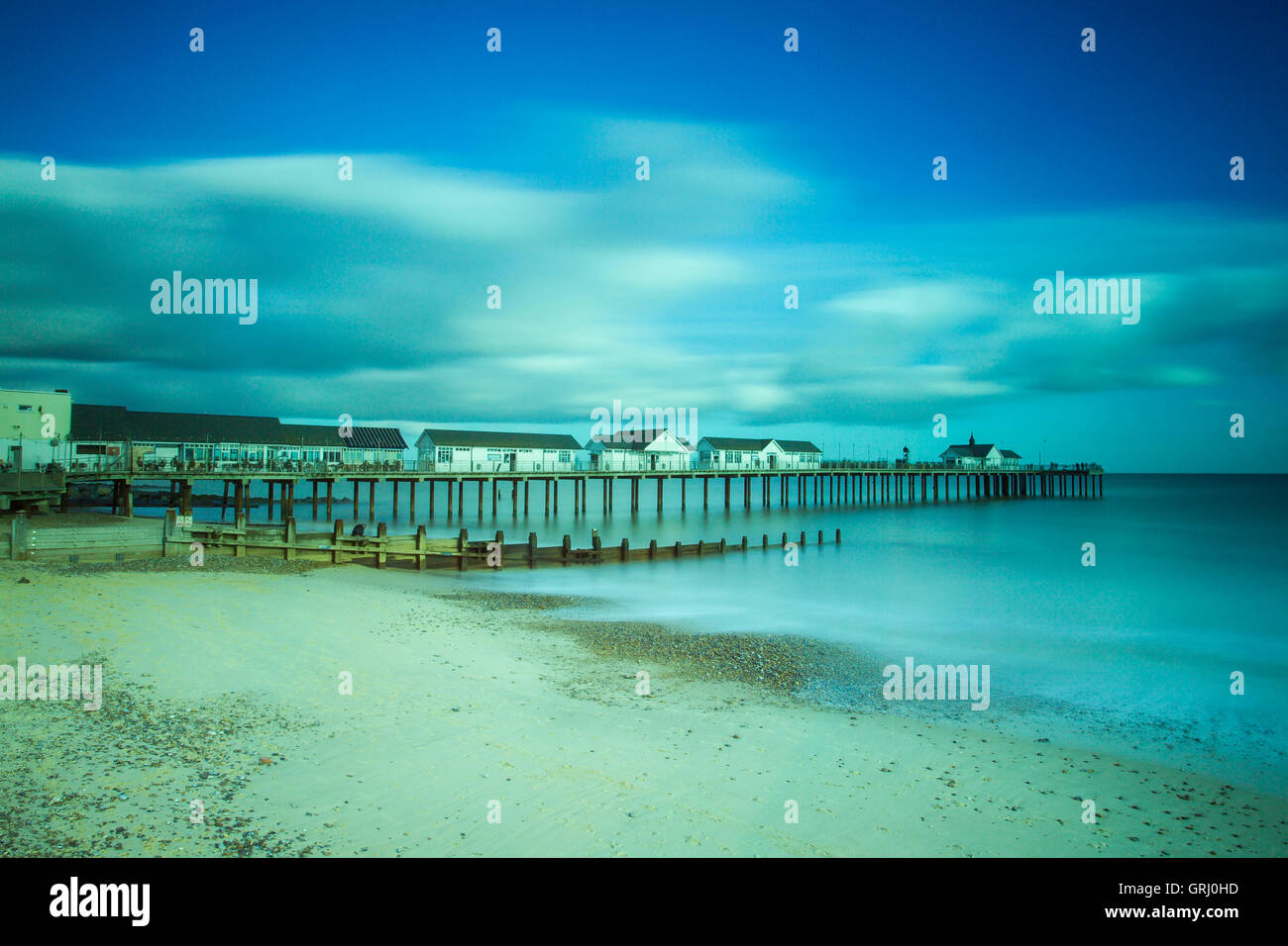 long exposure image showing view of the pier at Aldeburgh in Suffolk ...