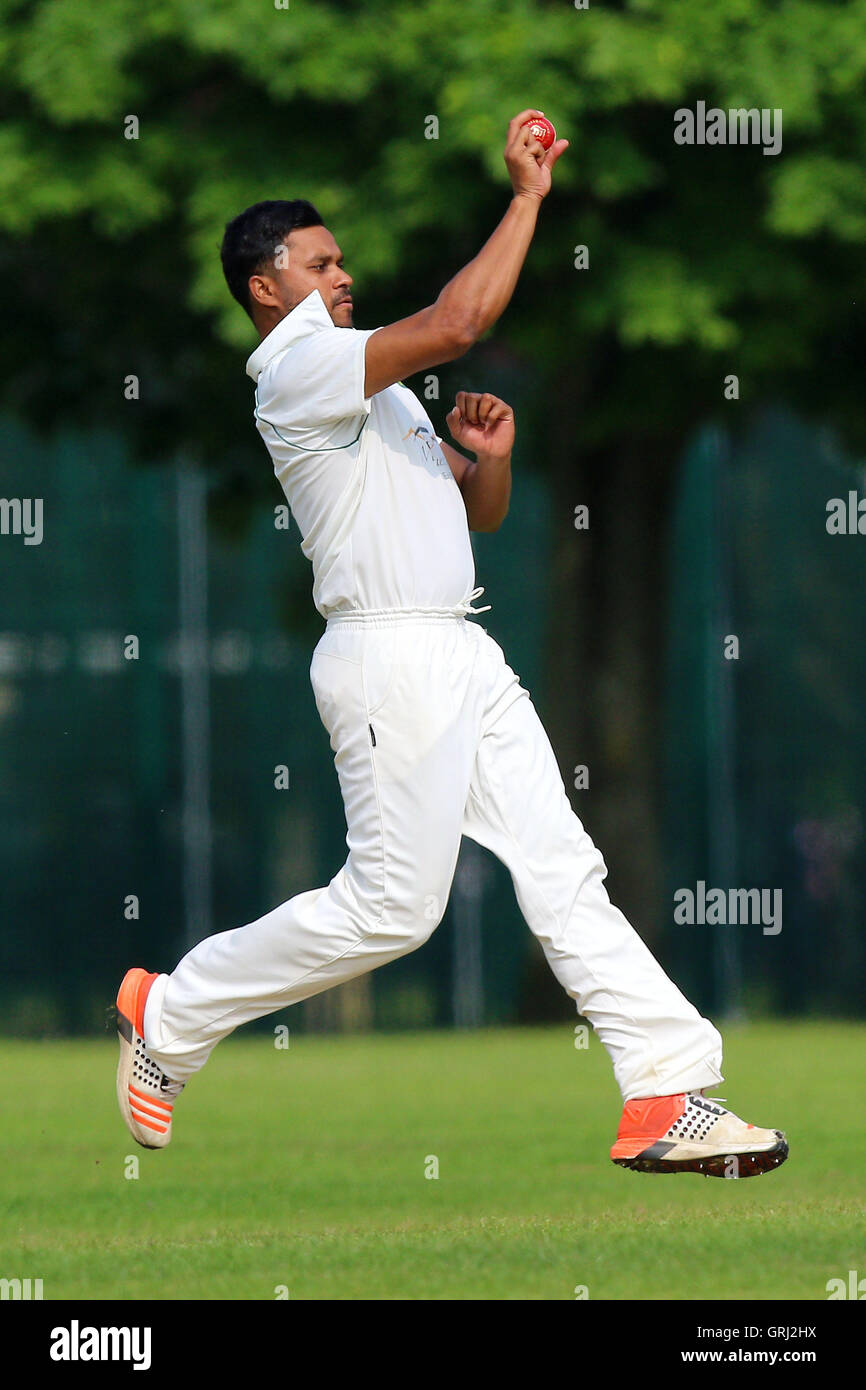 M Fahad in bowling action for Harold Wood during Upminster CC vs Harold ...