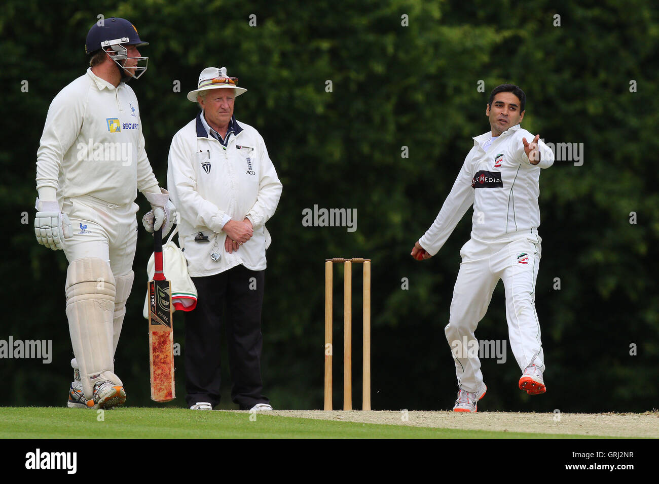 A Ali in bowling action for Ilford during Shenfield CC vs Ilford CC ...