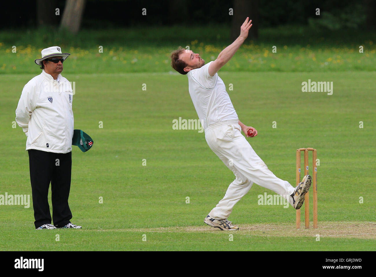 Richard Brabner in bowling action for Harold Wood during Harold Wood CC ...