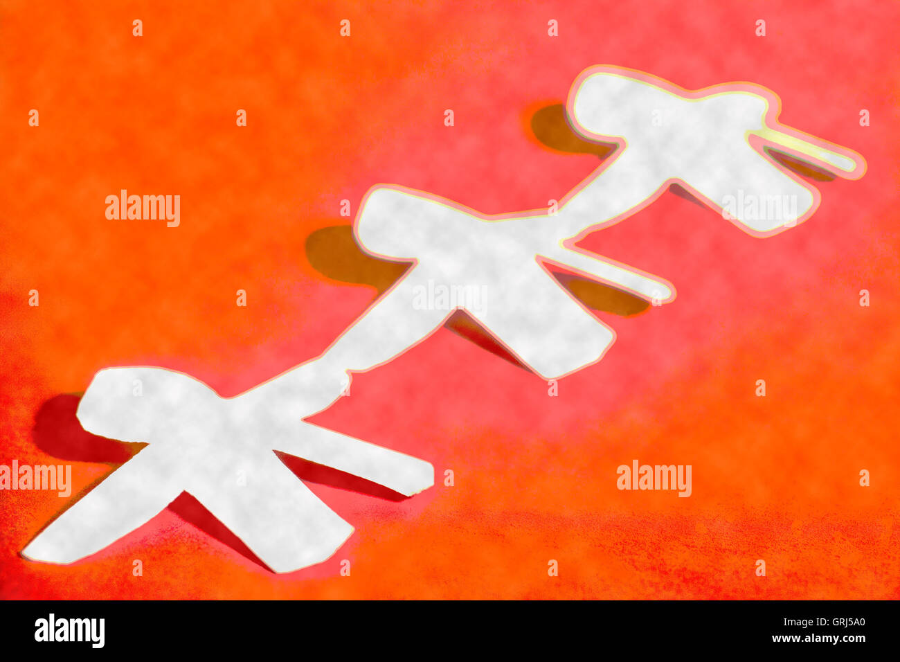 White paper people on red background Stock Photo - Alamy