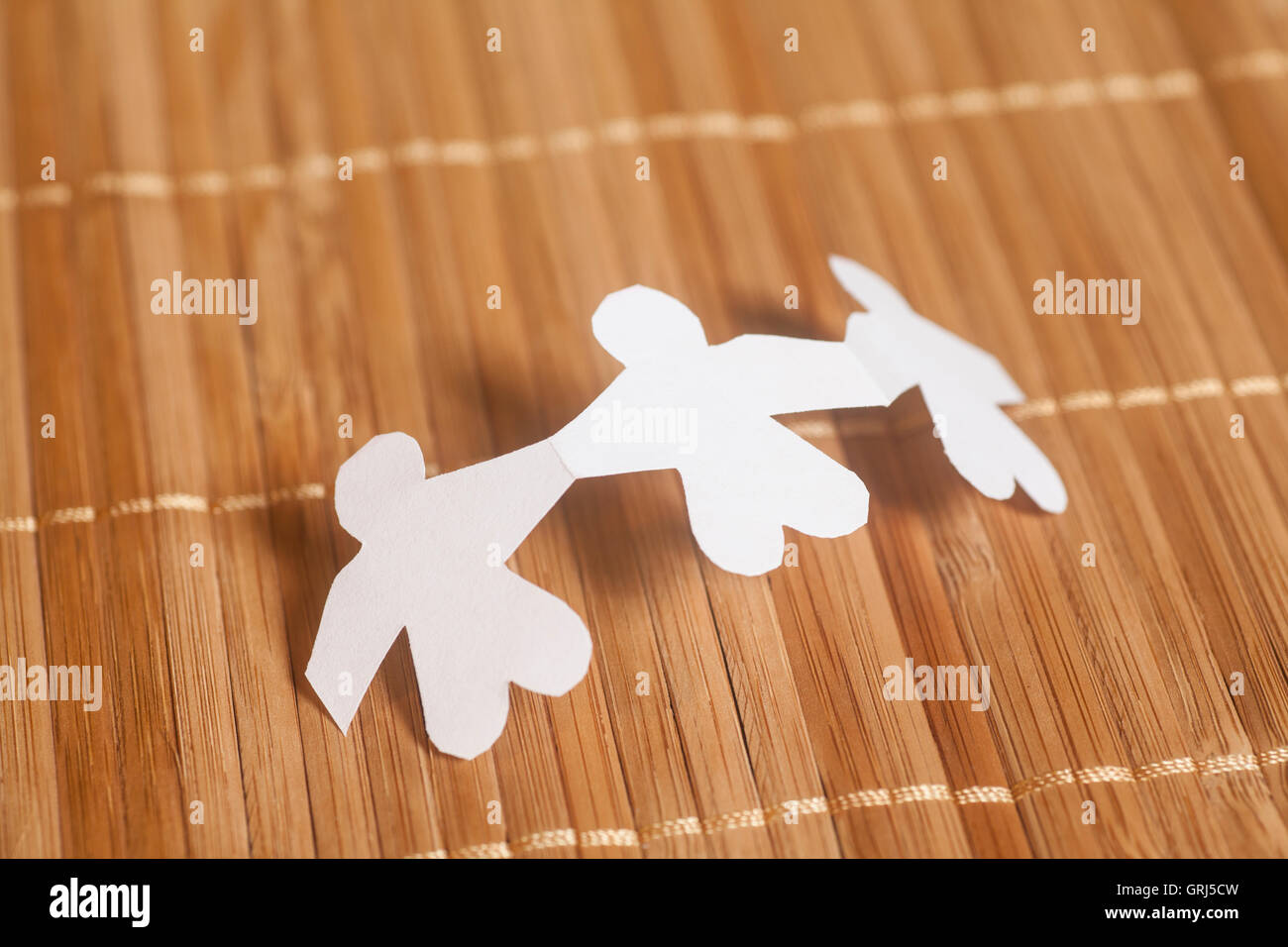 Group paper doll people hi-res stock photography and images - Alamy