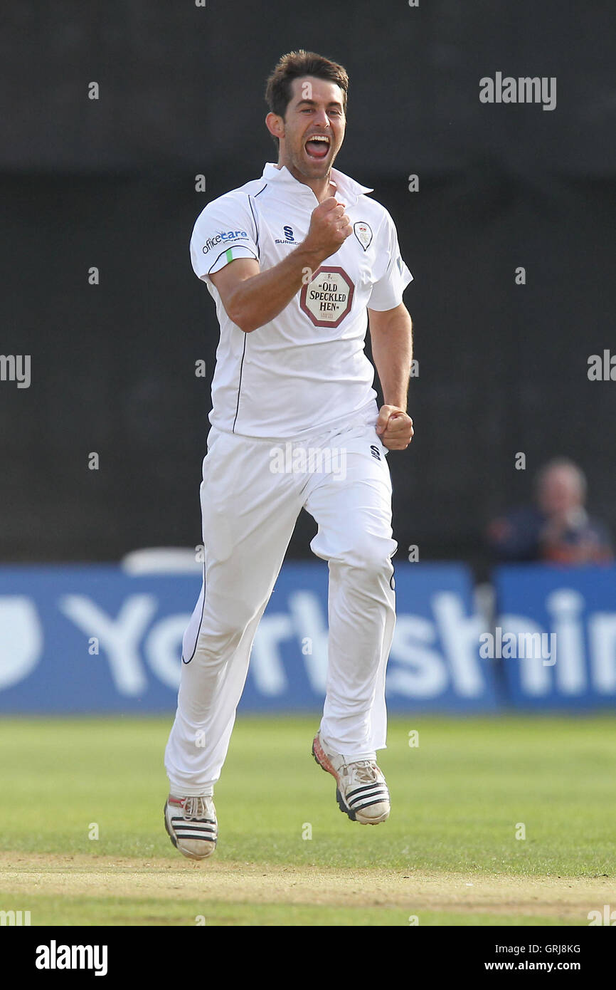 Tim Groenewald of Derbyshire celebrates the wicket of Jaik Mickleburgh ...