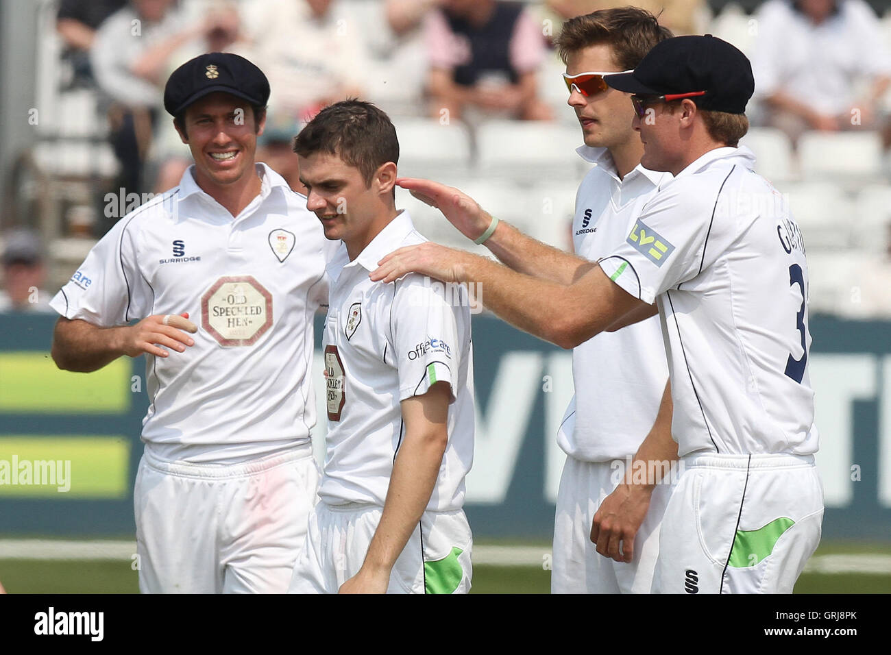 David Wainwright of Derbyshire is congratulated on the wicket of Ben ...