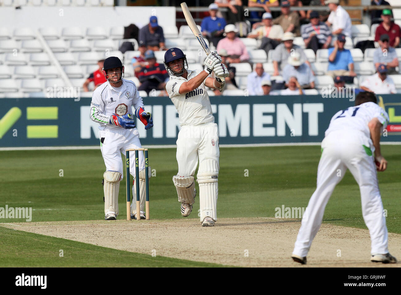 Mark Pettini of Essex gives a return catch to Derbyshire bowler David ...