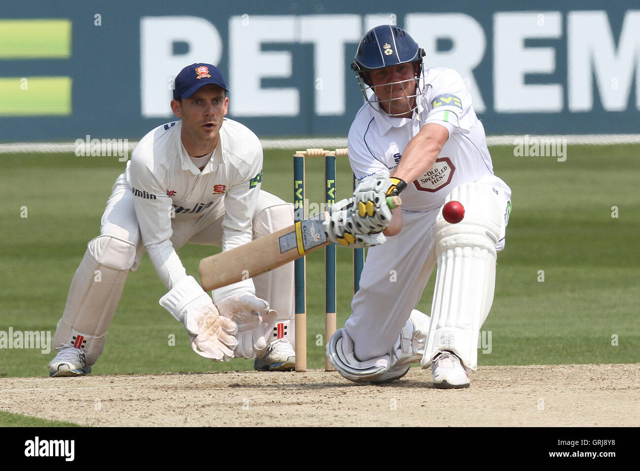 Wes Durston in batting action for Derbyshire as James Foster looks on ...