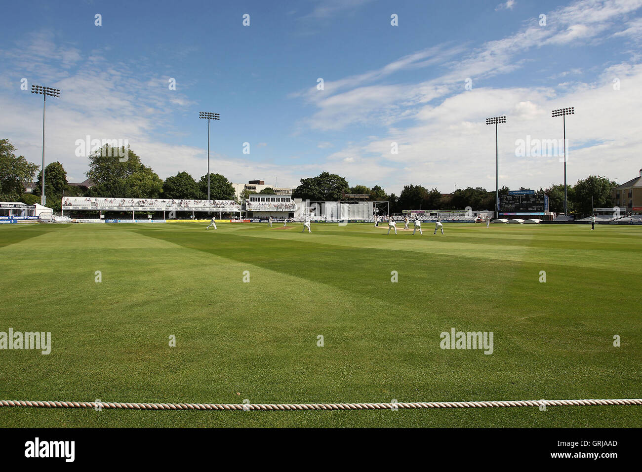 The rare sight of cricket being played under blue skies and warm ...