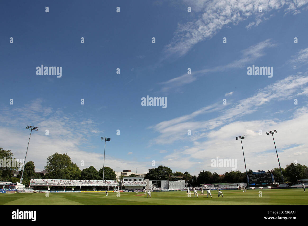 The rare sight of cricket being played under blue skies and warm ...