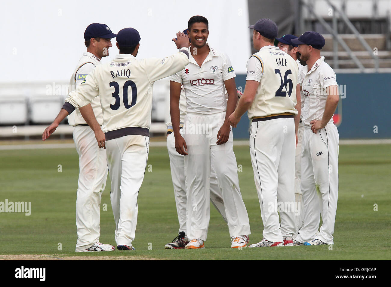 Moin Ashraf of Yorkshire (C) celebrates the wicket of Graham Napier ...