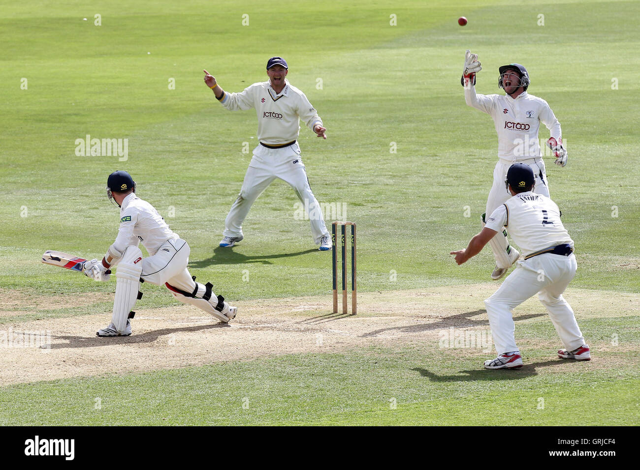 Adam Wheater of Essex is caught behind by Andrew Hodd from the bowling ...