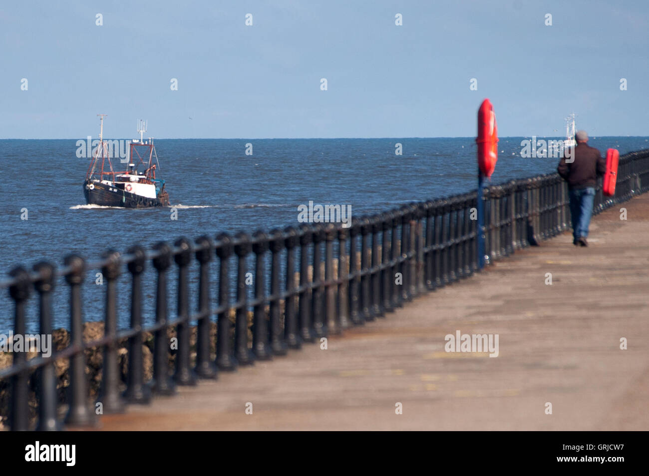 Trawler off pier hi-res stock photography and images - Alamy