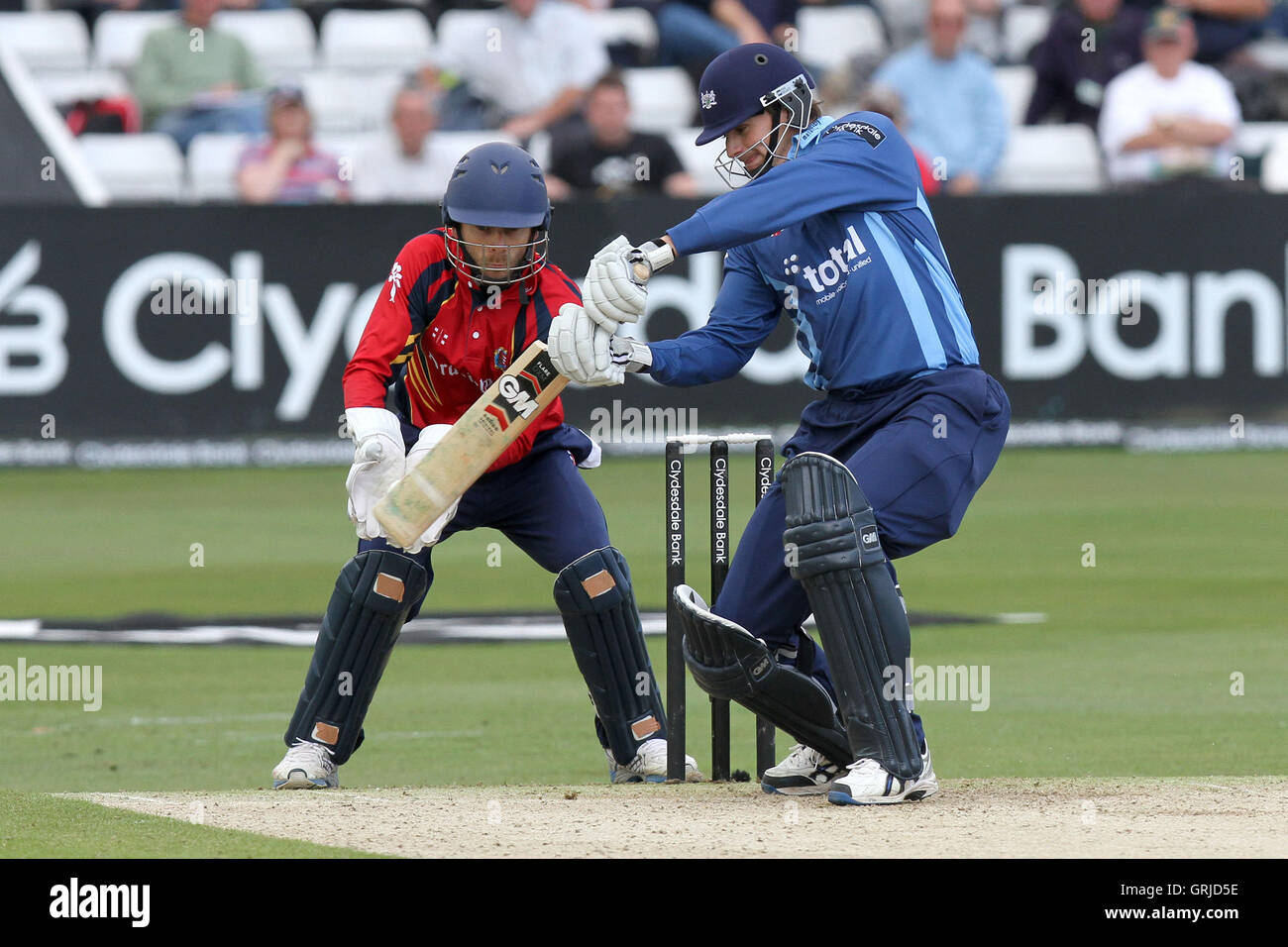 Alex Gidman in batting action for Gloucestershire as James Foster looks ...