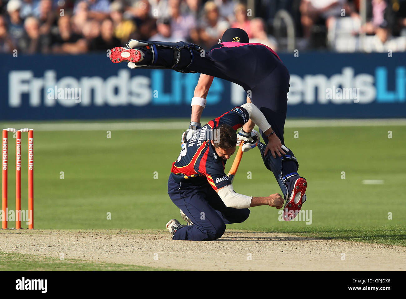 Greg Smith of Essex takes a return catch from his own bowling to ...