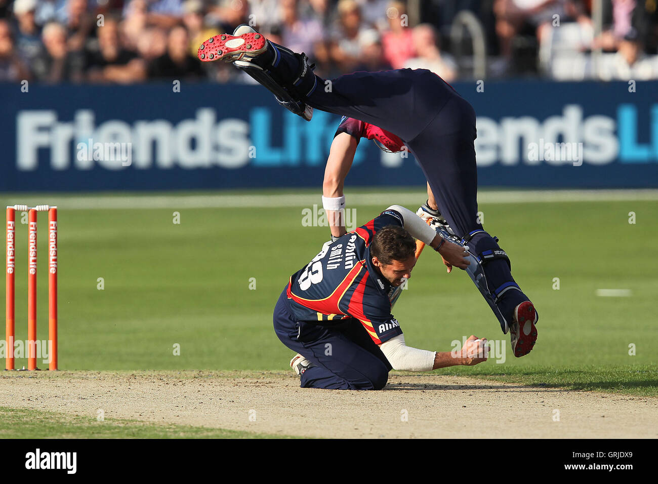 Greg Smith of Essex takes a return catch from his own bowling to ...