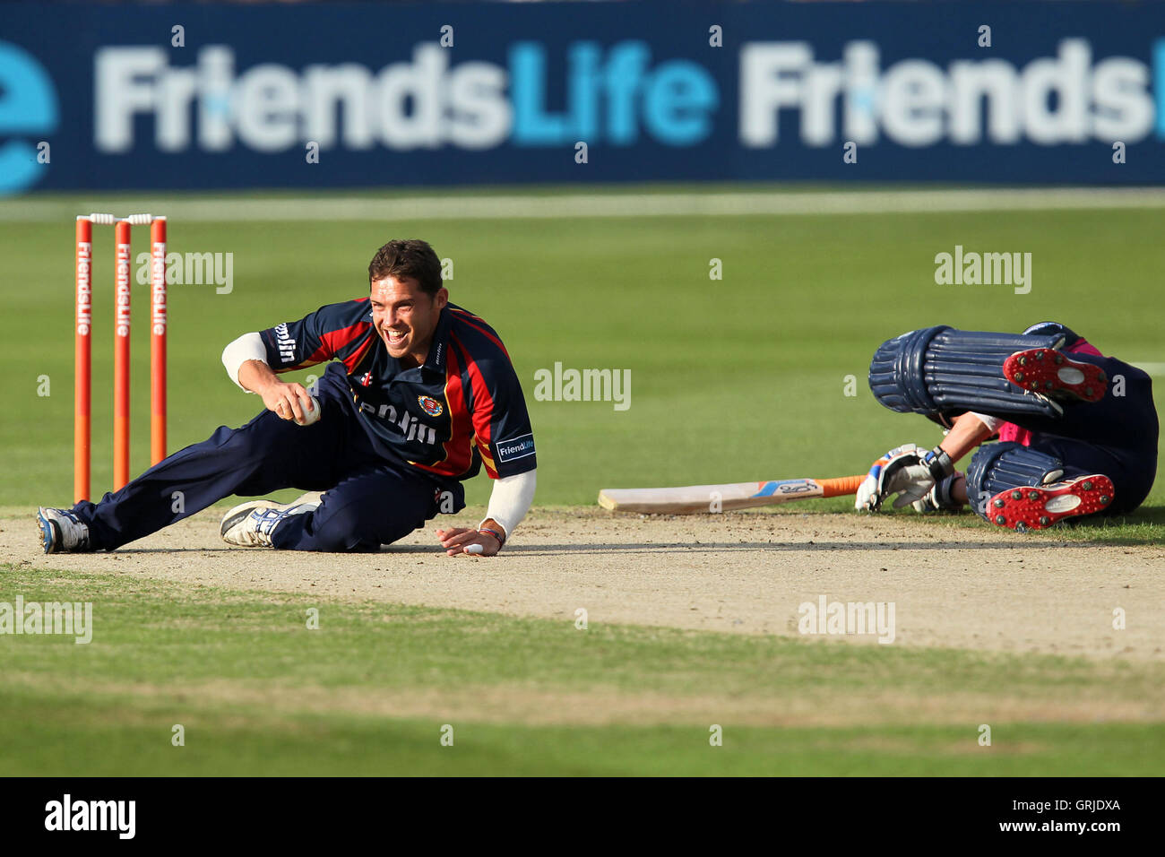 Greg Smith of Essex takes a return catch from his own bowling to ...