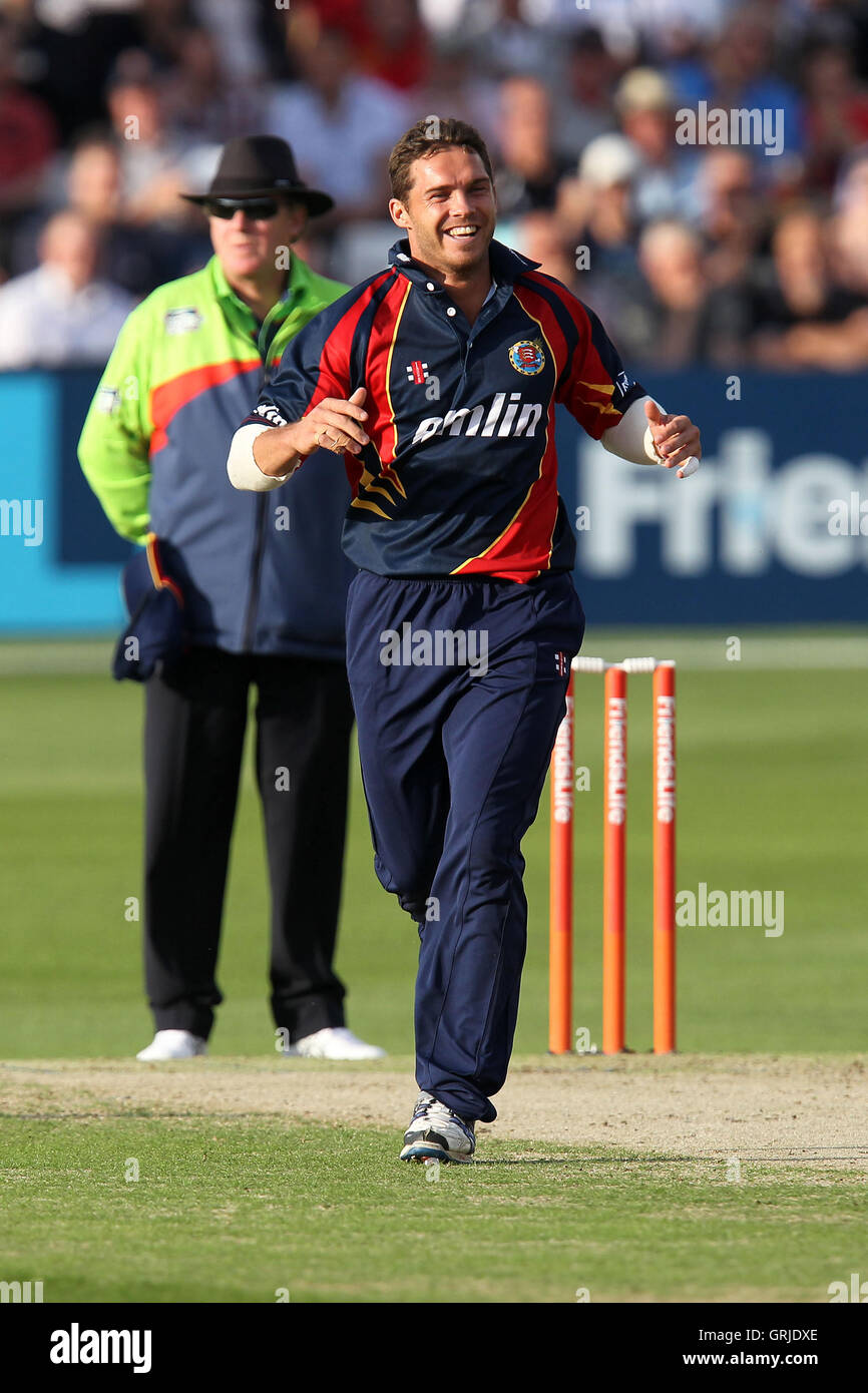 Greg Smith of Essex takes a return catch from his own bowling to ...
