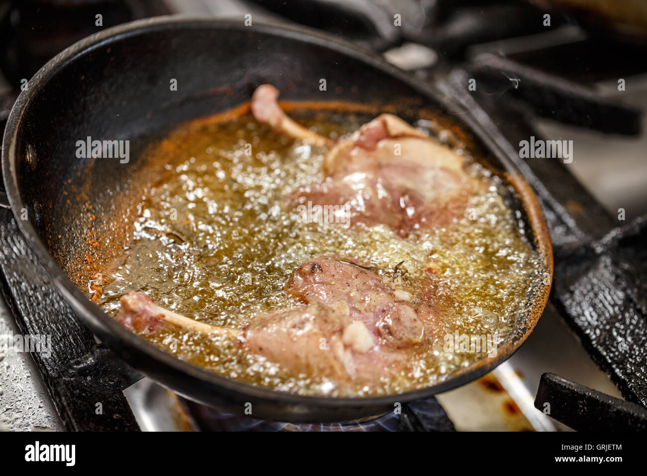 Duck leg roasted in a pan Stock Photo - Alamy