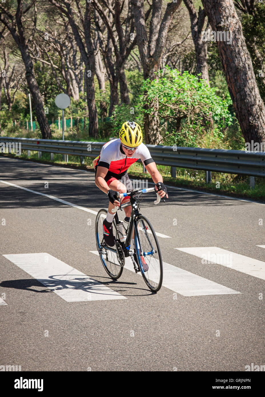 Grosseto, Italy - May 09, 2014: The disabled cyclist with the bike ...