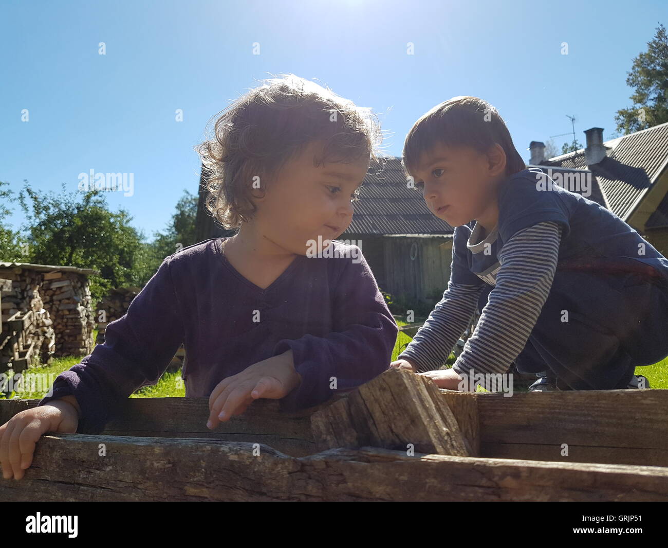 kids having fun at farm Stock Photo - Alamy