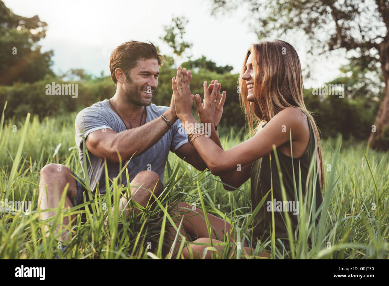Couple grass hi-res stock photography and images - Alamy