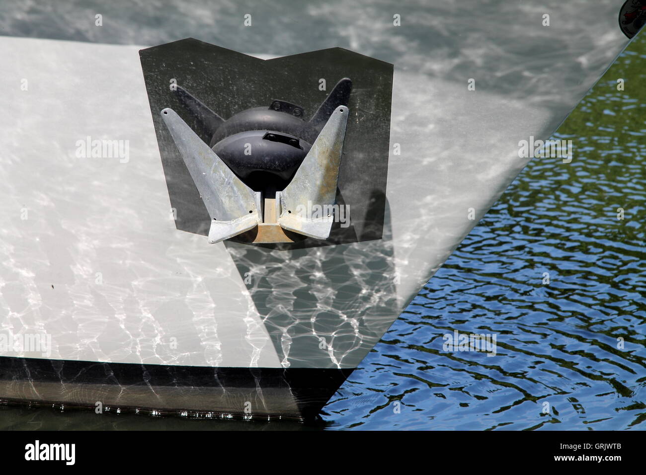 Bow of the ship with anchor. Water reflections Stock Photo - Alamy