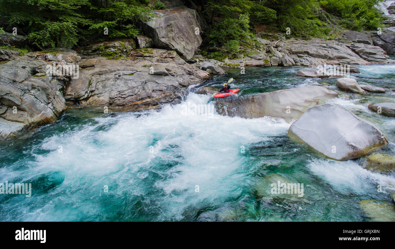 red kayak and waterfall, Val Verzasca, Ticino, Switzerland Stock Photo ...
