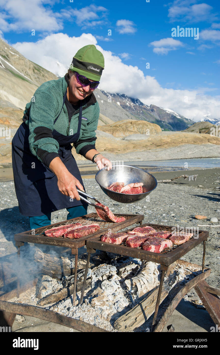 Woman Cooking Over Open Fire High Resolution Stock Photography and ...