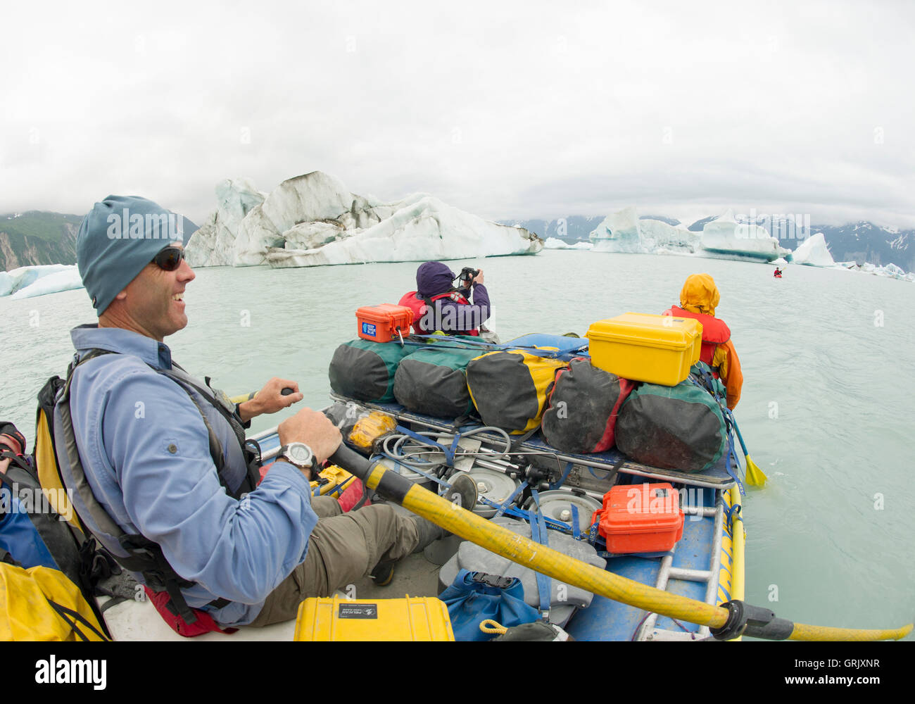 Rafters navigating icebergs on Alsek Lake Stock Photo - Alamy