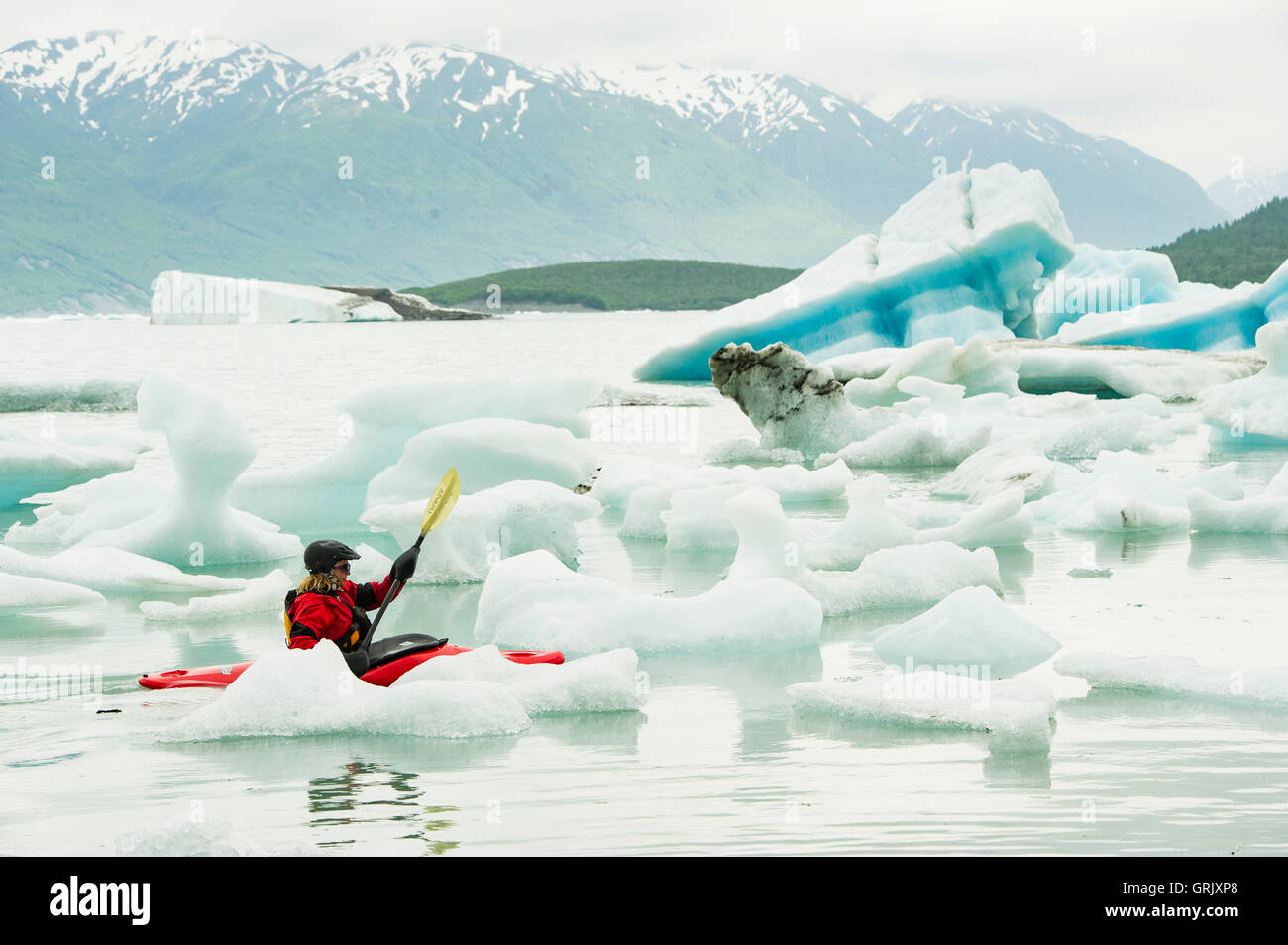 Kayakers navigating icebergs in Alsek Lake, Alsek River Stock Photo - Alamy