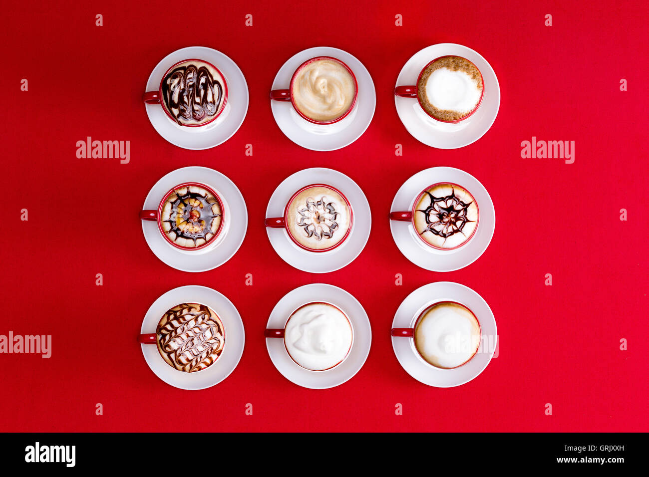 Overhead view of striking patterns and latte art depicted in the foam ...