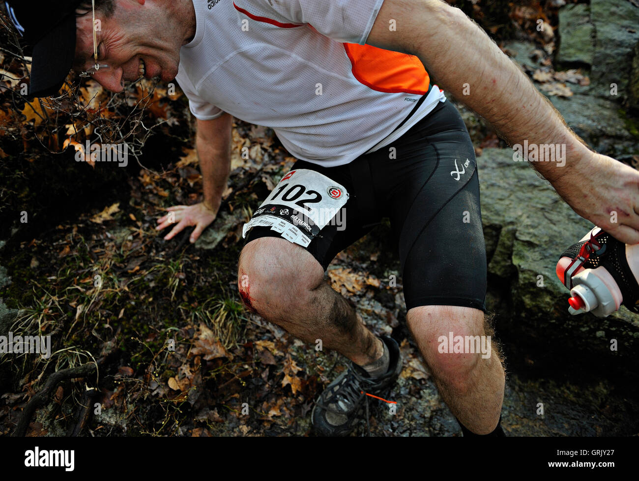 Runner Climbing a Trail Stock Photo - Alamy