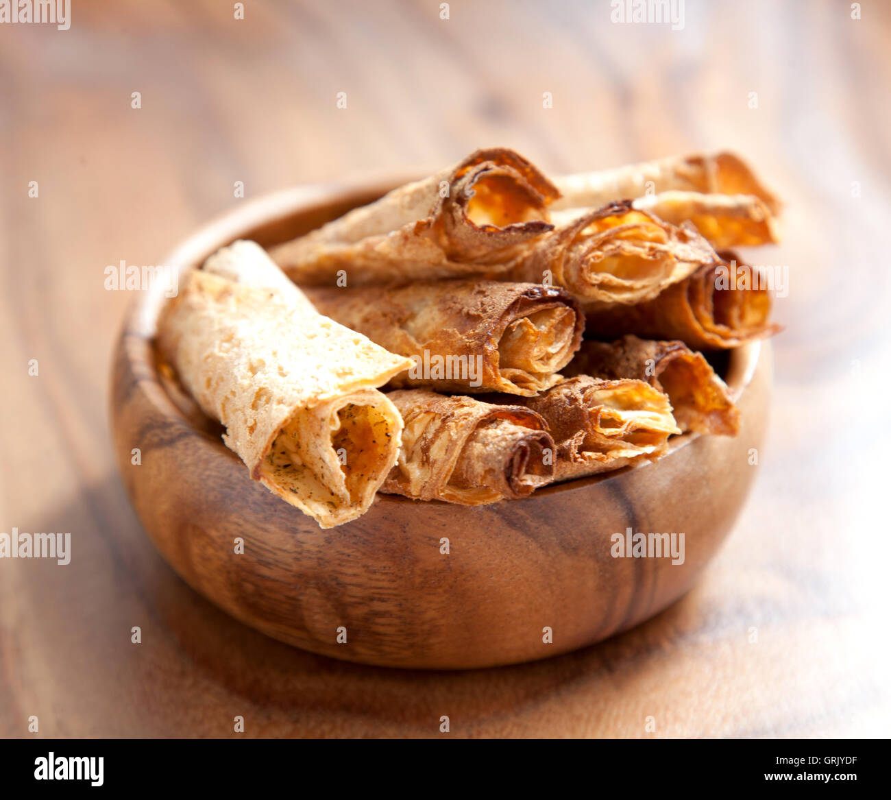 Fried bread rolls in a wooden bowl Stock Photo - Alamy