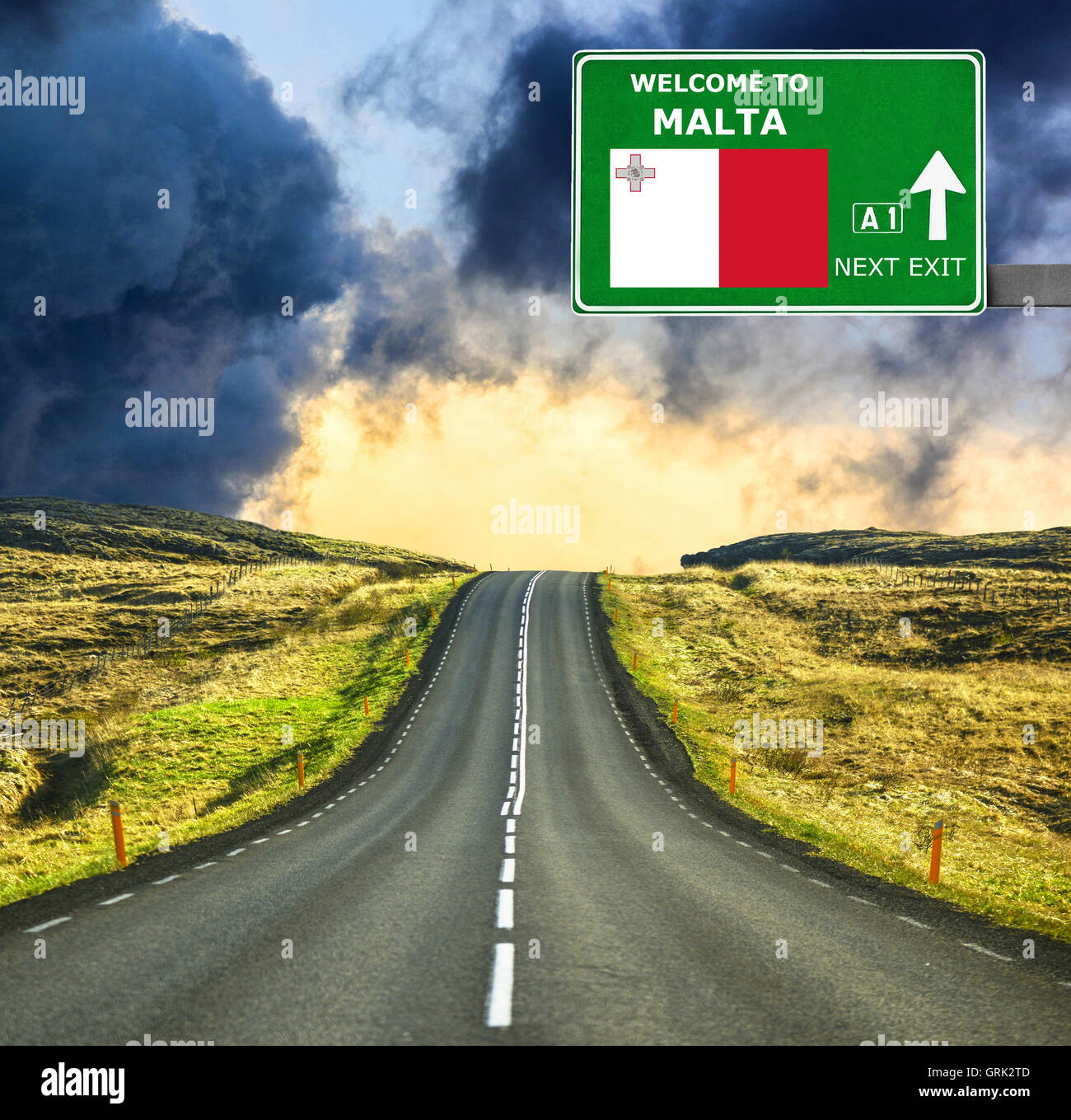 Malta road sign against clear blue sky Stock Photo - Alamy