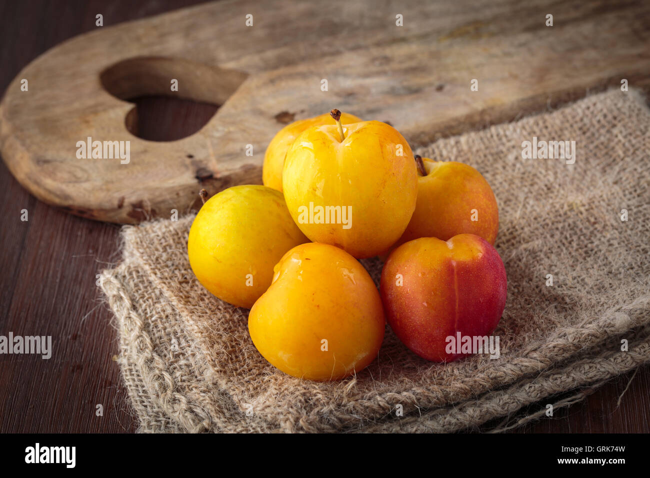 Fresh juicy golden plums for healthy nutrition Stock Photo - Alamy