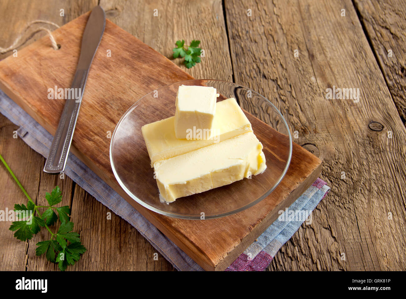 Butter over rustic wooden background with copy space Stock Photo - Alamy
