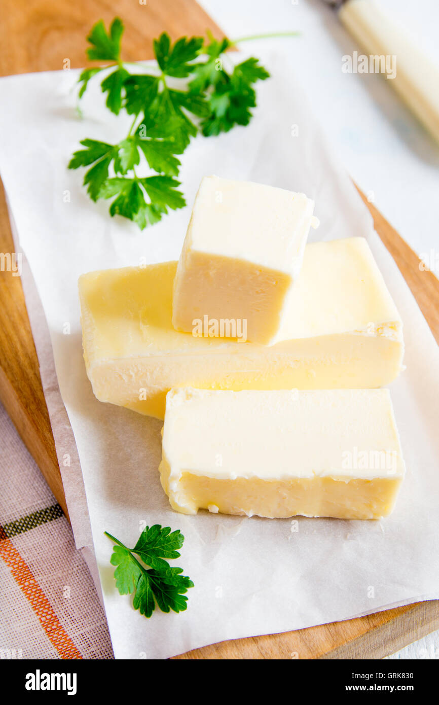 Butter over rustic wooden background Stock Photo - Alamy