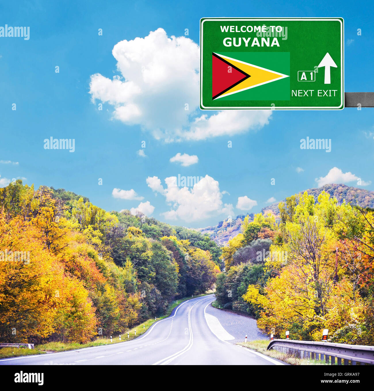 Guyana road sign against clear blue sky Stock Photo - Alamy