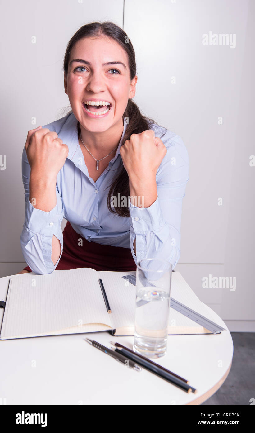 young business woman is cheering her success Stock Photo - Alamy