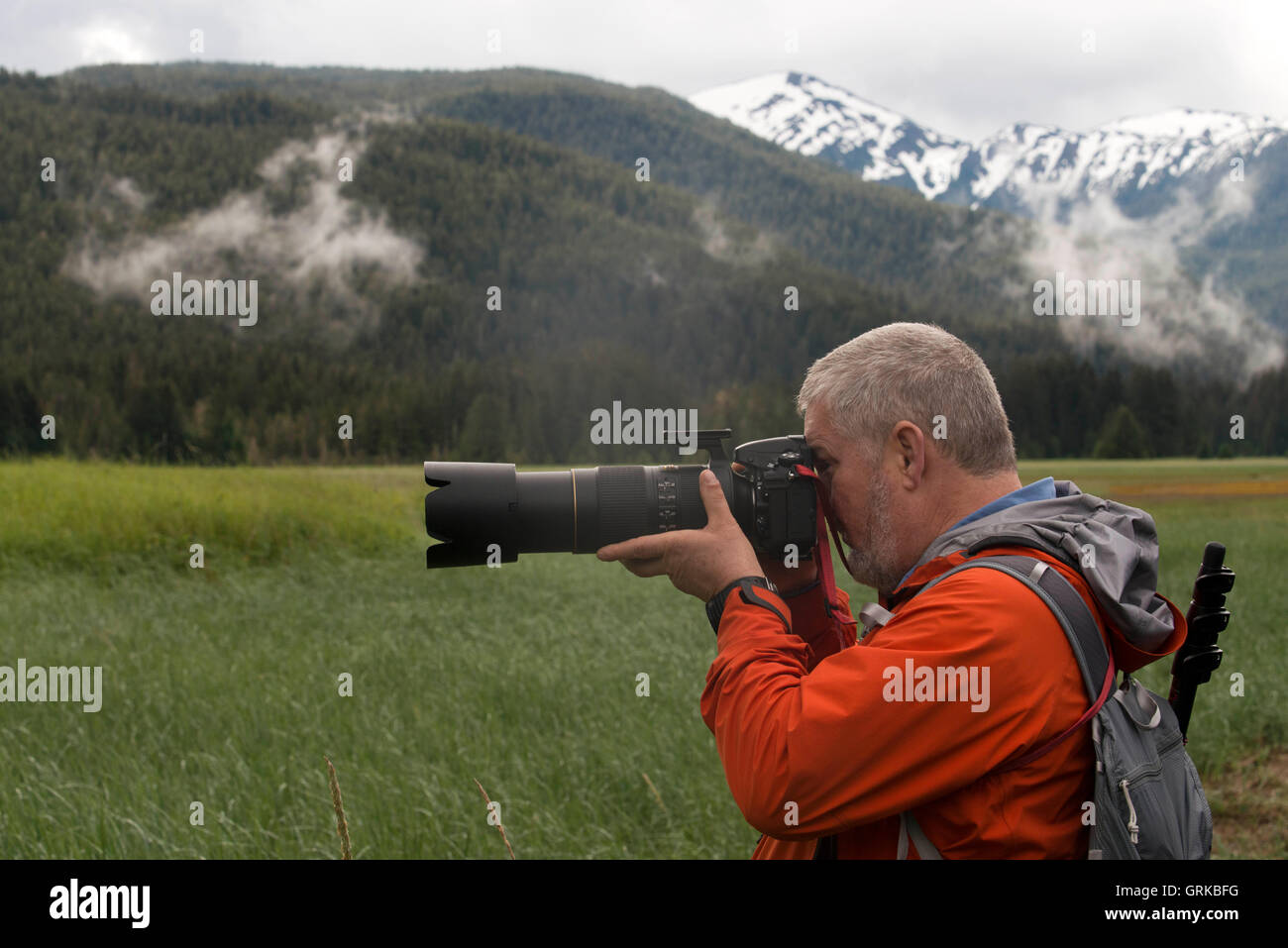 Man doing photos in Scenery Cove, Thomas Bay, Petersburg, Southeast ...