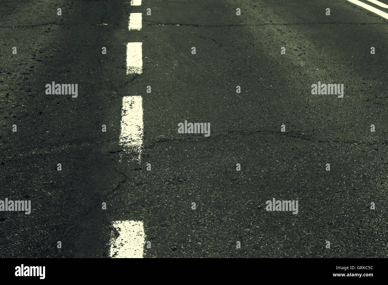 White grunge line on asphalt road Stock Photo - Alamy