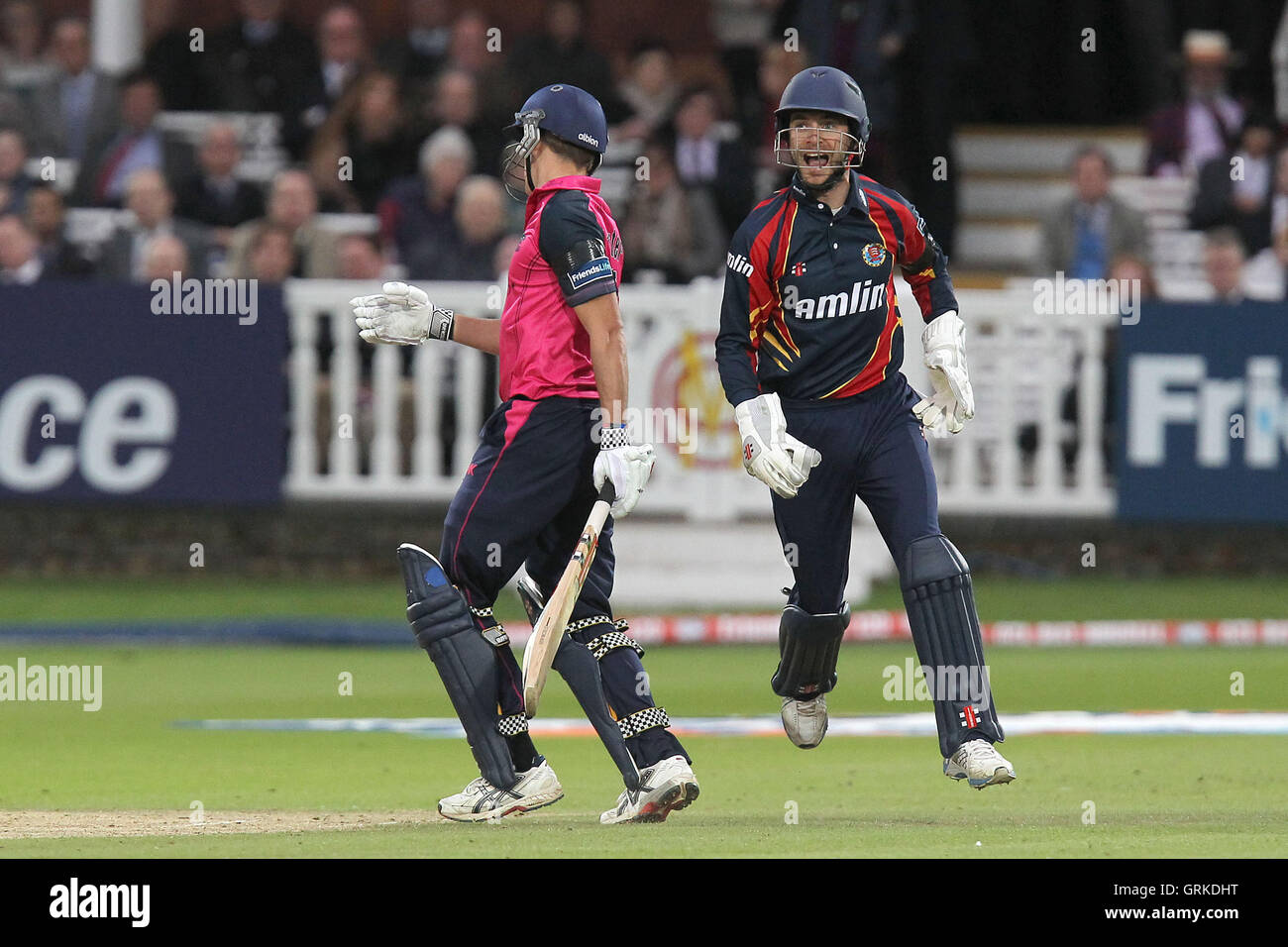 James Foster of Essex holds on to a catch to dismiss Neil Dexter from ...