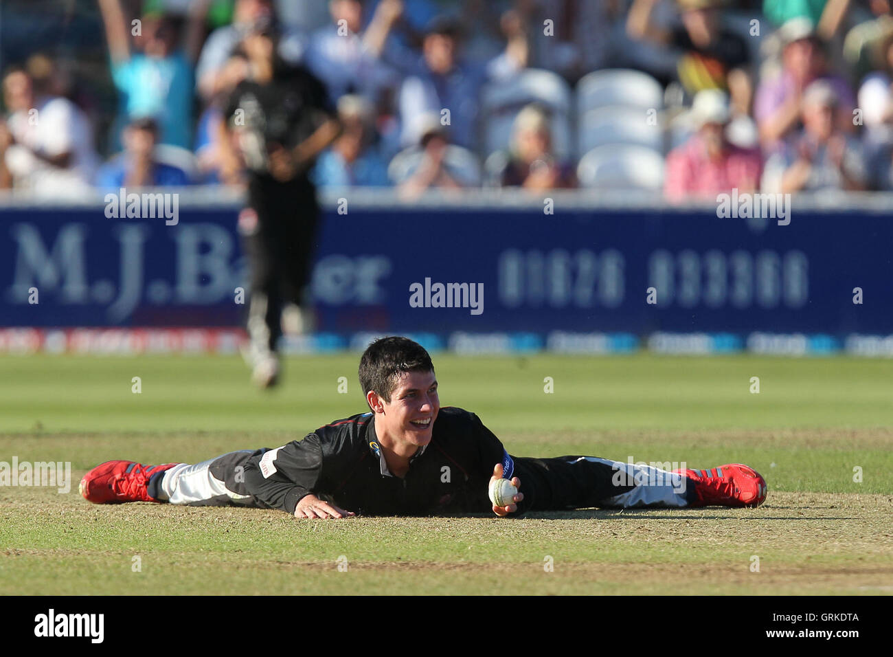 George Dockrell of Somerset celebrates the wicket of James Foster ...