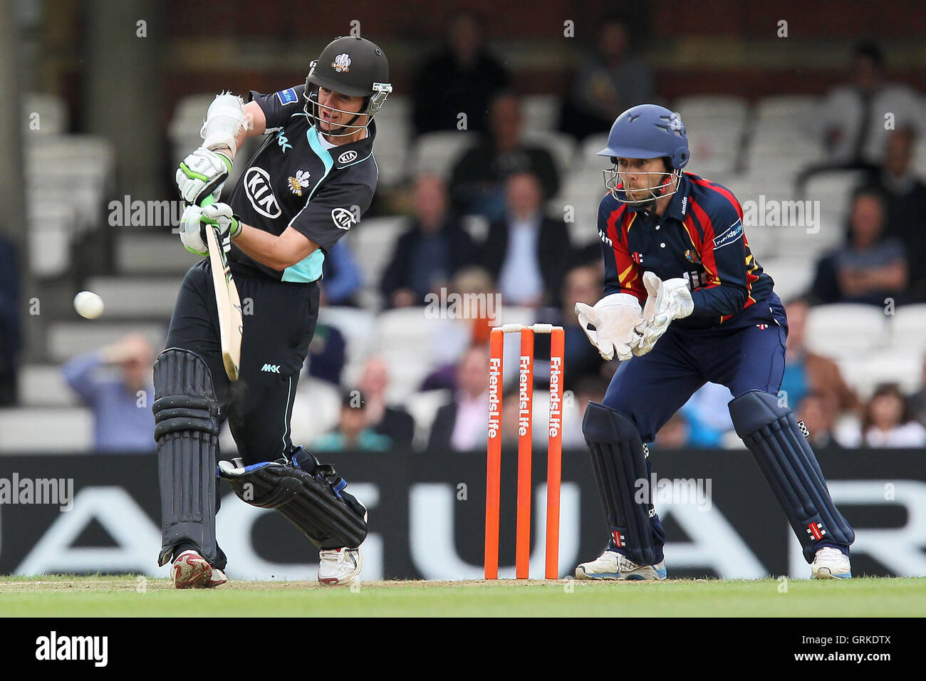 Steven Davies in batting action for Surrey as James Foster looks on ...
