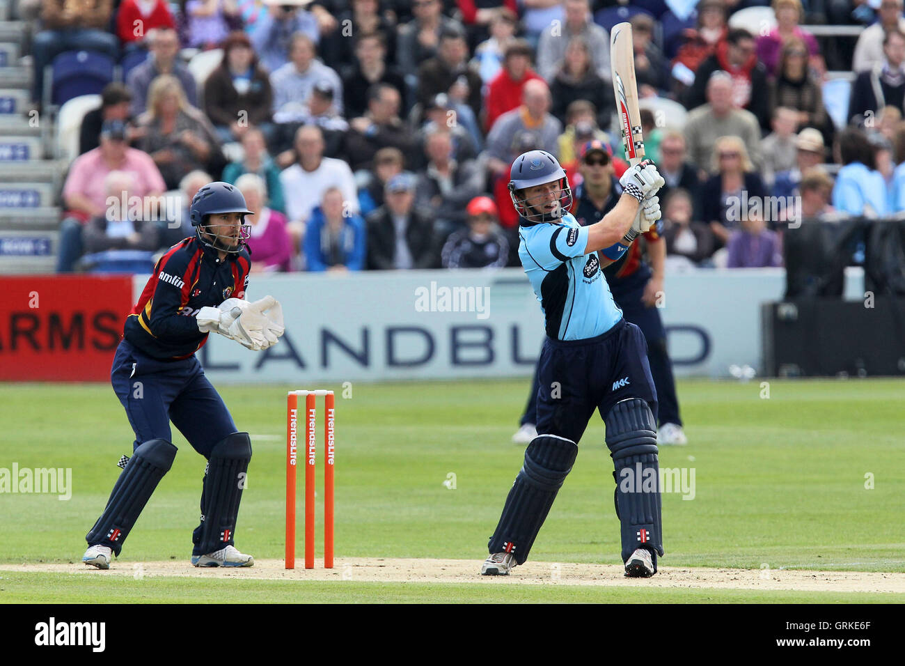 Chris Nash in batting action for Sussex as James Foster looks on ...