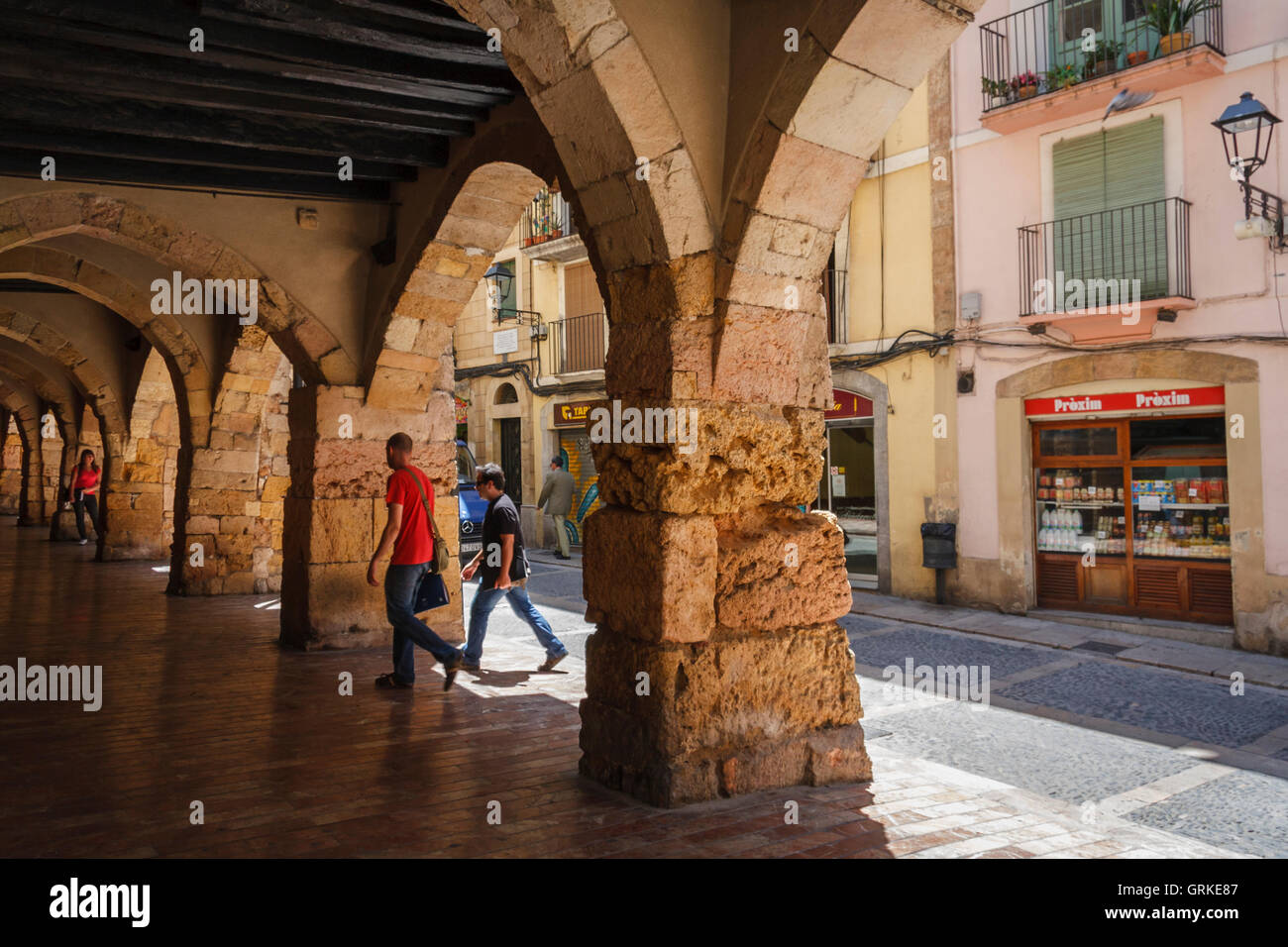 Stone gothic arches on Merceria street. Tarragona old town, Catalonia ...