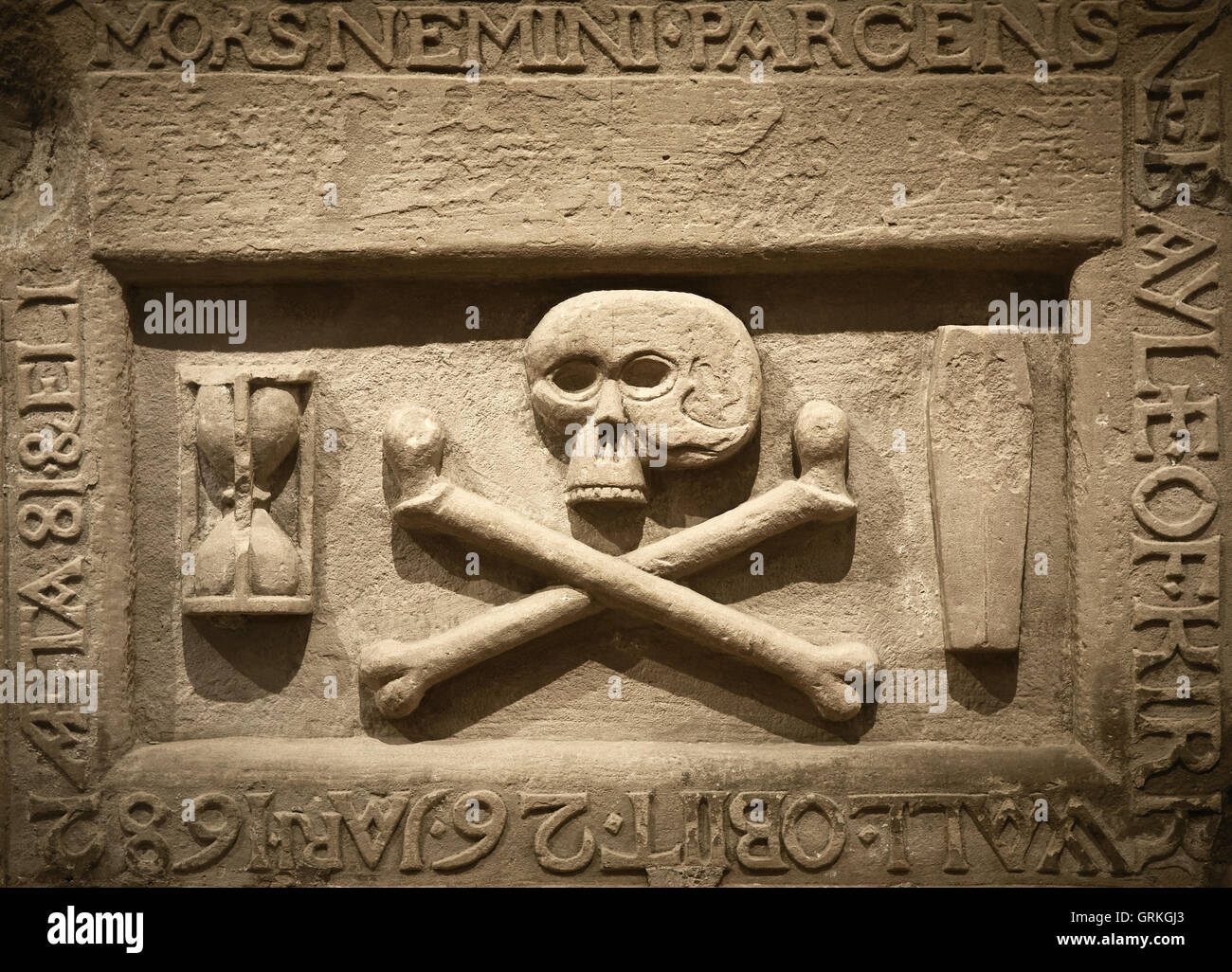 Skull and cross bones with latin text in a tomb. Horizontal Stock Photo ...