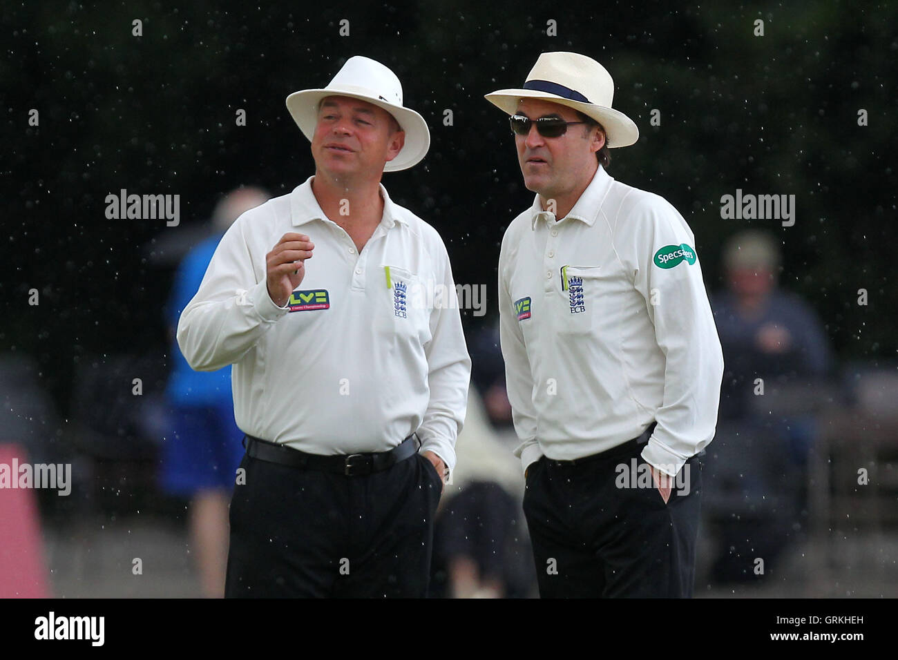 Umpires Graham Lloyd (L) and Steve O'Shaugnessy check the prevailing ...
