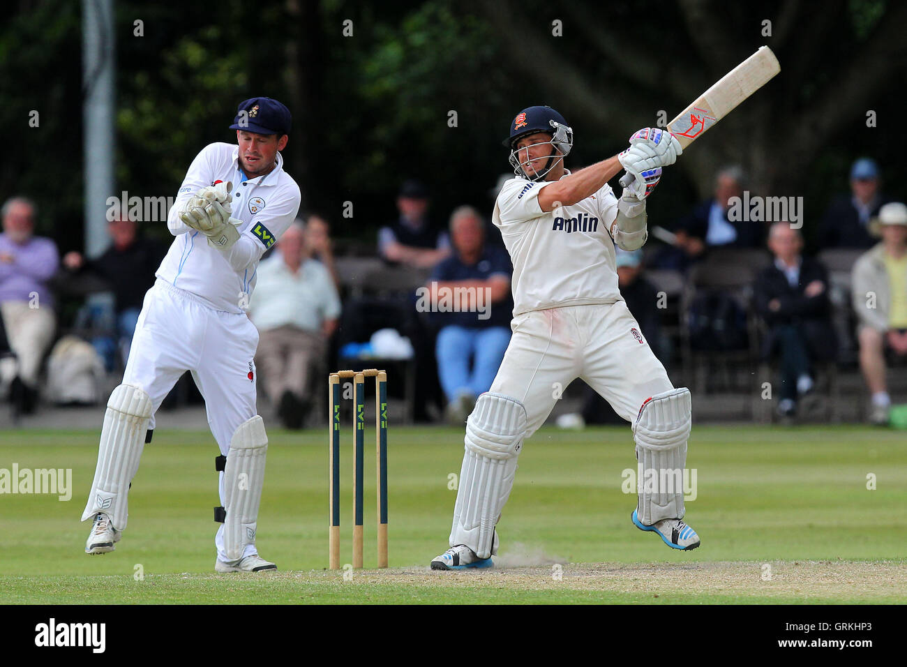 Greg Smith in batting action for Essex as Gareth Cross looks on ...